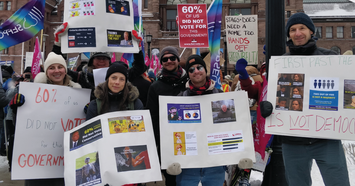 Fair Vote Canada volunteers in front of the Ontario Liberal Party AGM ...